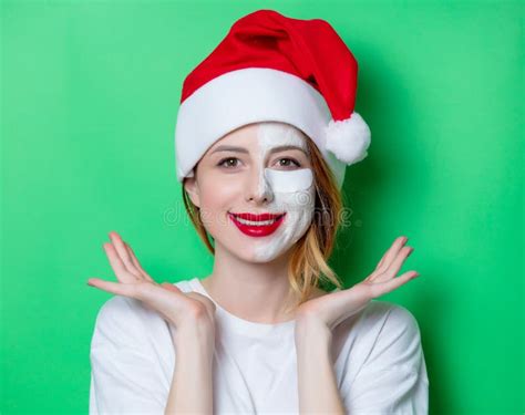 Woman Using Eye Patch For Her Eyes In Santa Claus Hat Stock Image