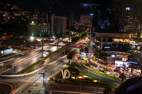 Modern Urban Traffic And Buildings View At Night Valle Oriente In