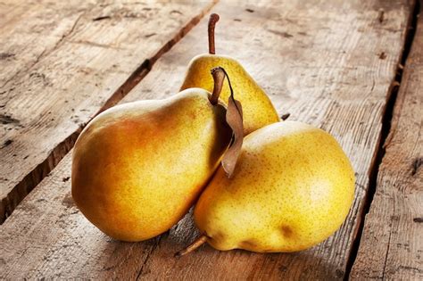 Premium Photo Three Juicy Ripe Pears