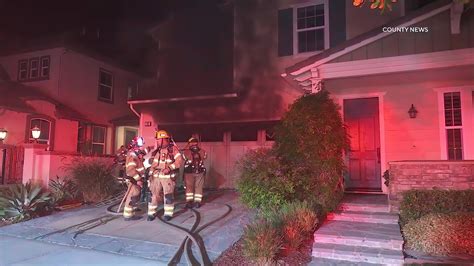 Fire Erupts While Tesla Charges Inside Garage Irvine Ca Youtube