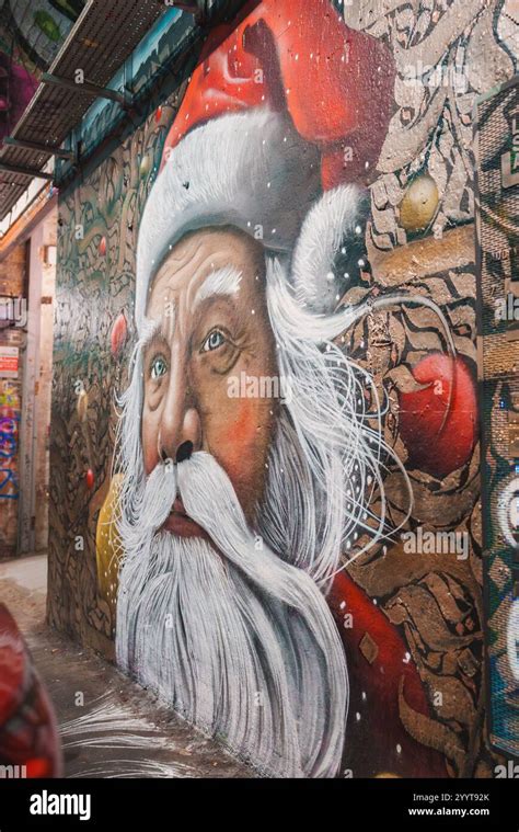 Vibrant Santa Claus Mural In Londons Urban Street Art Scene Stock