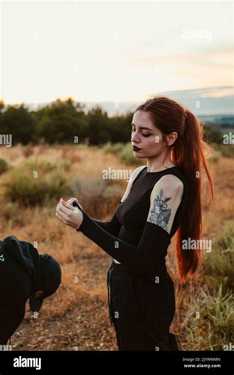 Natural Redhead Pierced Back Tattoo