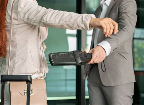 Airport Security Male Check At Gates With Metal Detector And Scanner