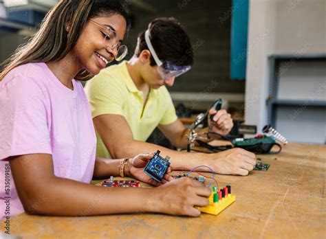Babe Diverse Babes Learning Together At Stem Robotics Class Hispanic Latin Female Building