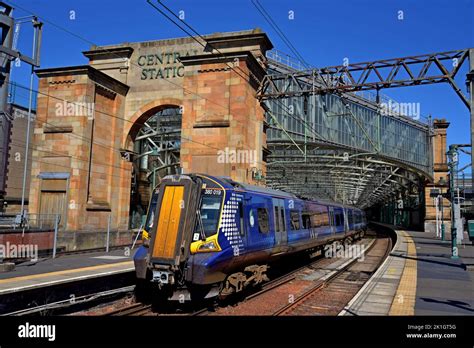 A Siemens Class 380 Desiro Electric Train Departs Glasgow Central