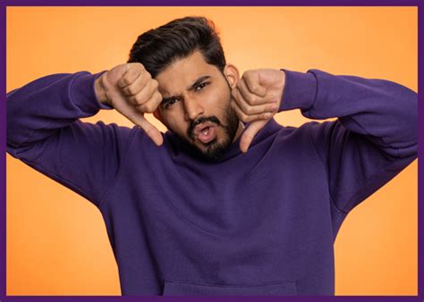 Photo Of A Man Giving Two Thumbs Down Orange Background · Zaggocare