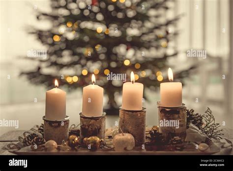 The Four Candles On The Advent Wreath Are Lit Every Sunday According To