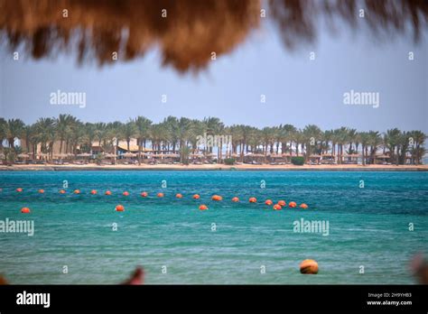 Yellow Buoys Floating On Sea Surface As Marker For Swimming Restriction