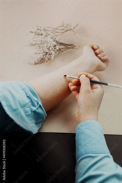 Brow Master Preparation For Work Brow Scheme On Skin Of Hand Is Drawn With Brush Neutral