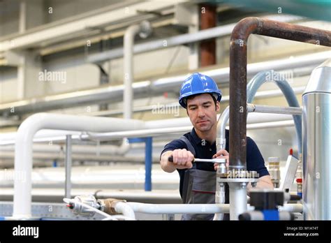 Assembler In An Industrial Plant Assembly And Repair On Site Stock