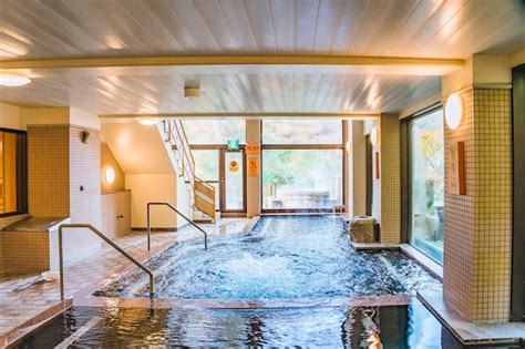 Premium Photo Japanese Hot Springs Onsen Natural Bath Surrounded By
