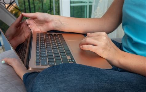 Premium Photo Girl Working Typing On Laptop In Bedroom Close Up