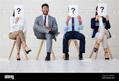Portrait Of Indian Businessman As Selected Candidate In Group Of