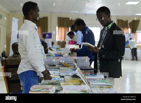 Reading Enthusiasts Browse The Book Stalls At The Mogadishu
