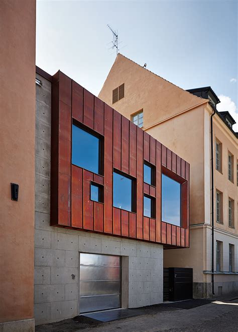 Copper Clad Facade Over Top Sculpted Cip Concrete Made To Look Like Cmu Architecture
