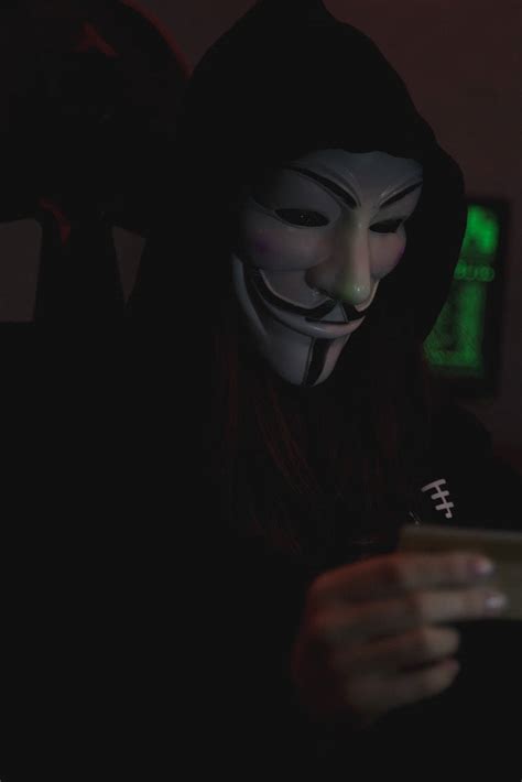 Download Hacker Holding A Phone 3d Wallpaper