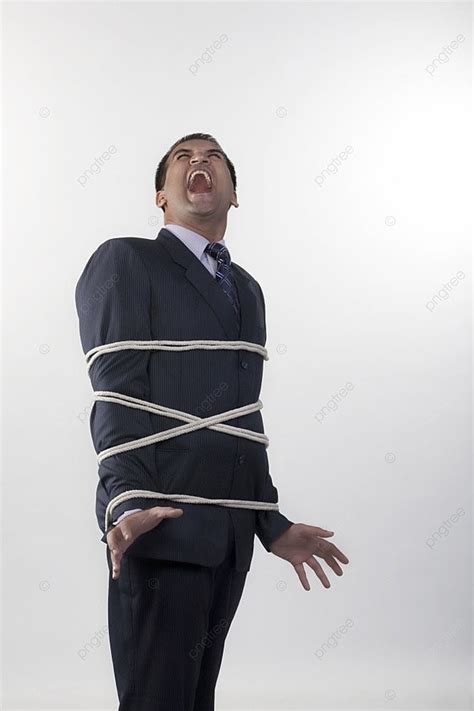 Businessman Tied Up With Rope Photo Background And Picture For Free