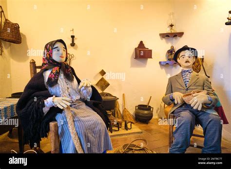Two Large Stuffed Dolls Of A Typical Period Portuguese Couple At