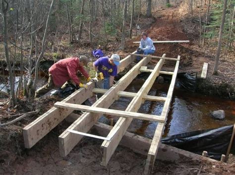 How To Build A Wooden Bridge Over A Creek Wooden Bridge Garden