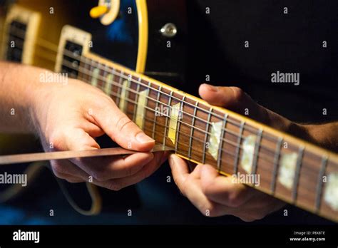 Measuring The String Height Or Action Which Is Part Of A Guitar Setup And Repair Uk Stock