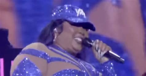 Lizzo Pours Curves Into Sheer Slashed Bodysuit As She Hits Back At
