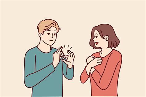 청각 장애인 남자와 여자는 수화를 사용하여 이야기하고 손으로 상징을 시연합니다 수화에 대한 스톡 벡터 아트 및 기타 이미지