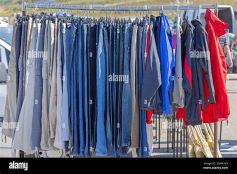 Jackets And Pants Garment For Sale At Flea Market Stock Photo Alamy