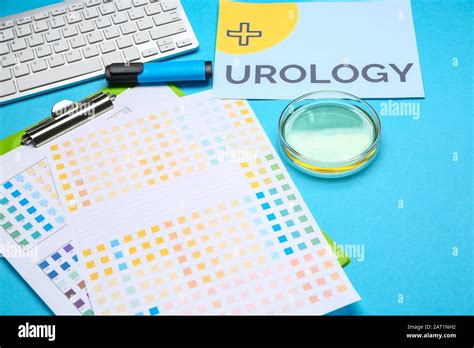 Paper Sheet With Text UROLOGY Petri Dish And PC Keyboard On Color