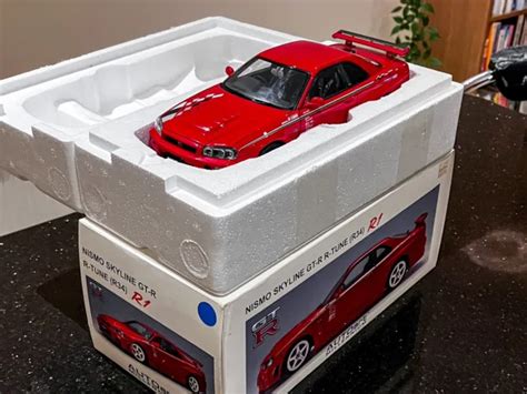 AUTOART NISSAN SKYLINE R34 GTR Nismo R Tune R1 1 18 77357 Active Red