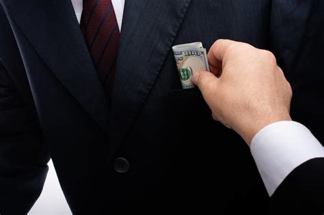 Premium Photo Concept For Corruption And Bribing Fraud With Bundle Of