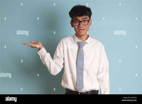 Indonesian Senior High School Student Wearing White Shirt Uniform With