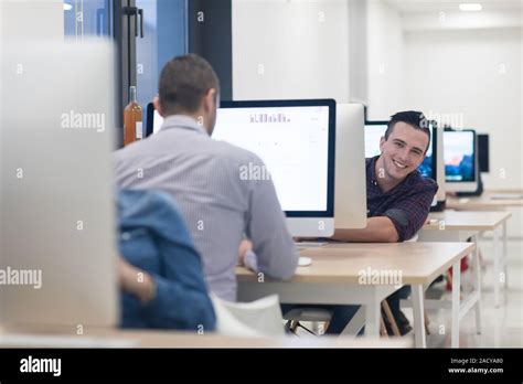 Startup Business Software Developer Working On Desktop Computer Stock