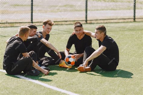 Free Photo Men Play Socer At The Park Tournament On Mini Footbal