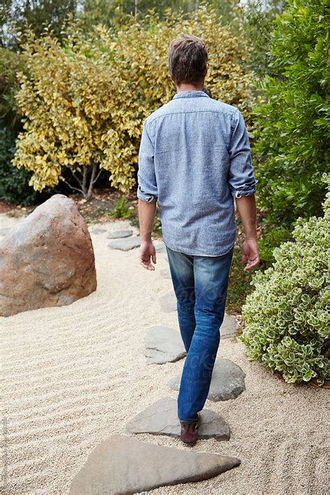 Man Walking On Path In Japanese Garden By Stocksy Contributor Trinette Reed Stocksy