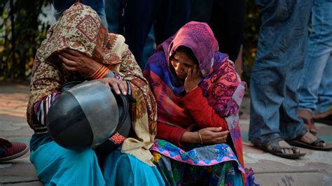 New Delhi Factory Fire Relatives Identify Victims From Photos On