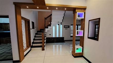 Storage Wall Designs By Interior Designer Vinu Kumar