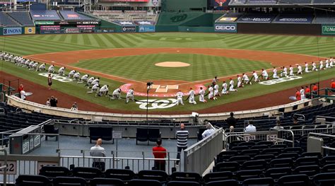 Yankees And Nationals Kneel Before The National Anthem