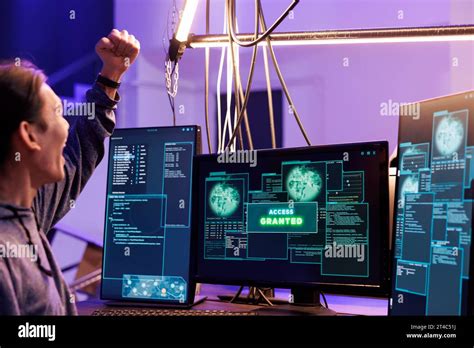 Hacker Celebrating Access Granted To Computer System And Doing Illegal Activities Young Asian