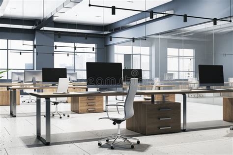 An Office Interior With Modern Design Empty Desks With Computers