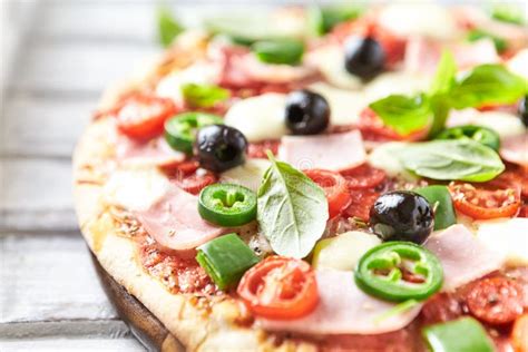 Pizza With Ham Mozzarella Cheese Cherry Tomatoes Green And Jalapeno