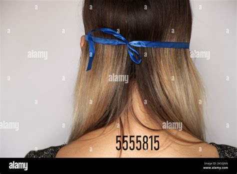 Girl With A Serial Number On Her Back Personal Number Of A Person Not Freedom Lack Of Will