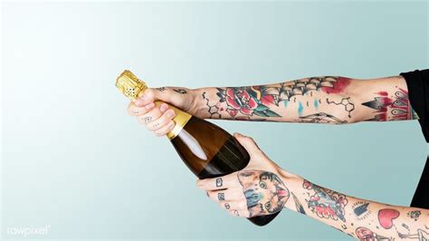 Tattooed Hand Holding A Bottle Of Champagne Premium Image By Rawpixel