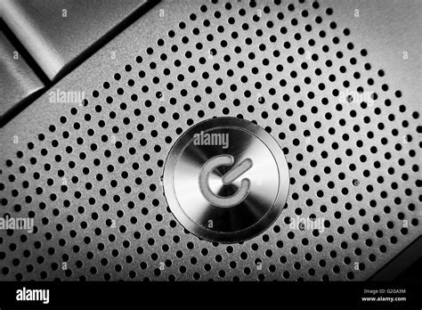 Silver Color Power Button Macro Closeup With Holes Grid Arround Stock Photo Alamy