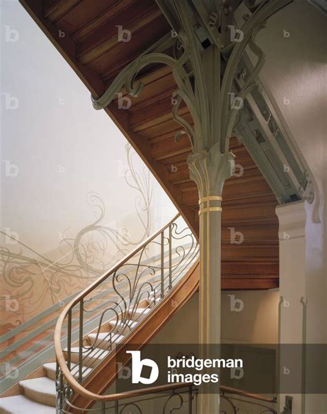 Image Of Ground Floor Stairwell Mural And Ironwork Hotel Tassel 6 Rue