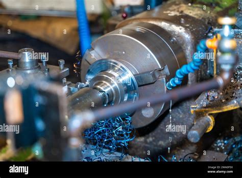 The Cnc Milling Machine Cuts Metal Parts With A Milling Machine And
