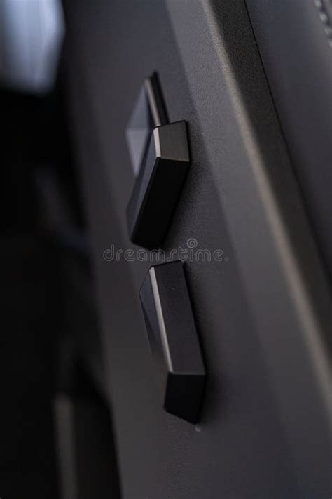 close up view of seat adjustment buttons in tesla cybertruck stock