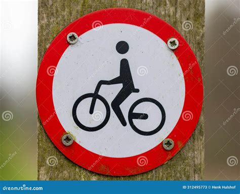 Red Round Prohibition Sign With A Black Silhouette Of A Man Crossed Out