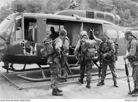 Five Members Of The Australian 2nd Squadron Sas Boarding A 9 Squadron