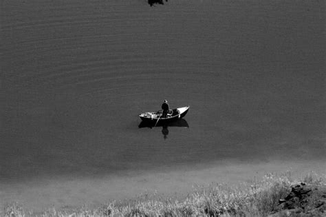 Premium Photo Man In Rowboat