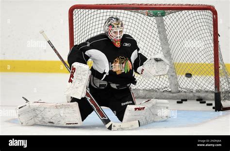 Chicago Blackhawks Goalie Antti Niemi Makes A Save During Practice In